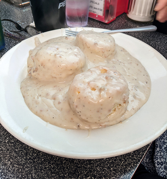 Biscuits swimming in sausage gravy&mdash;the kind of breakfast that requires a nap afterward and absolutely no apologies.
