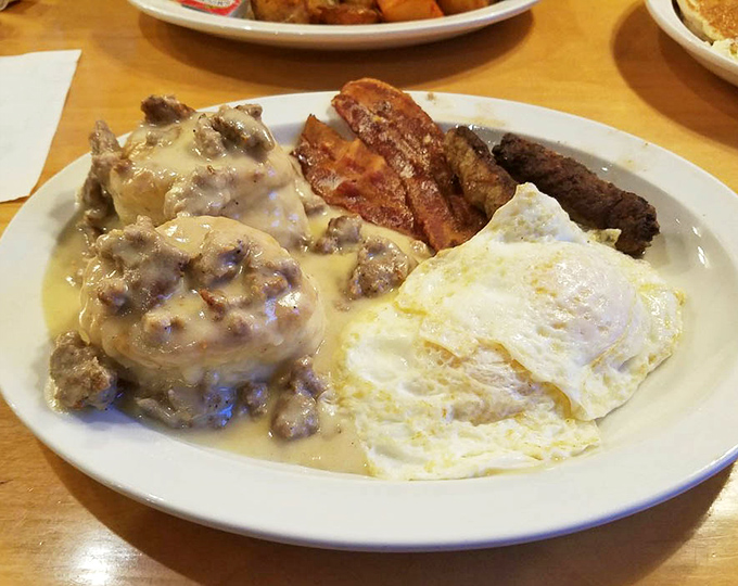 Biscuits swimming in creamy sausage gravy alongside eggs and bacon – the kind of breakfast that fueled generations of Pennsylvania farmers.
