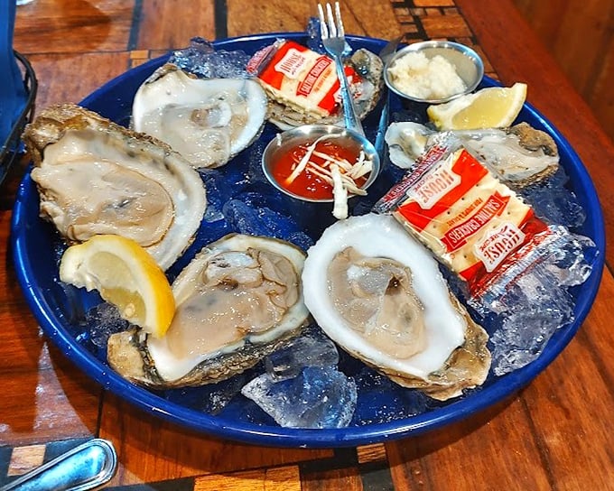 These oysters aren't just served—they're presented like the briny jewels they are, with all the proper accessories a mollusk could desire.