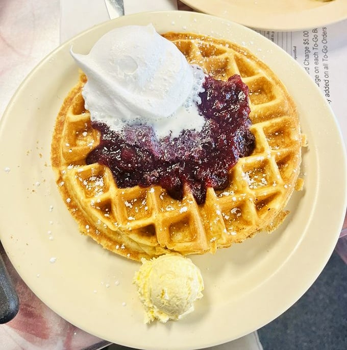 Belgian waffles crowned with berries &ndash; proof that sometimes more really is more.