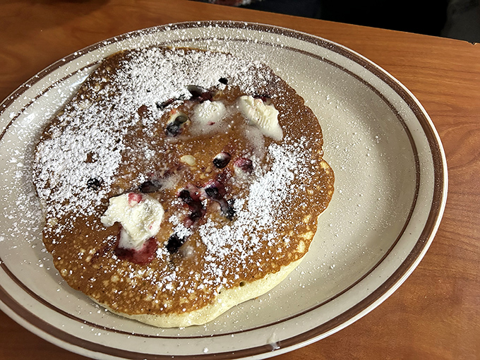 A blueberry pancake that's more treasure map than breakfast&mdash;each purple jewel leading you to another bite of fluffy, sweet perfection.
