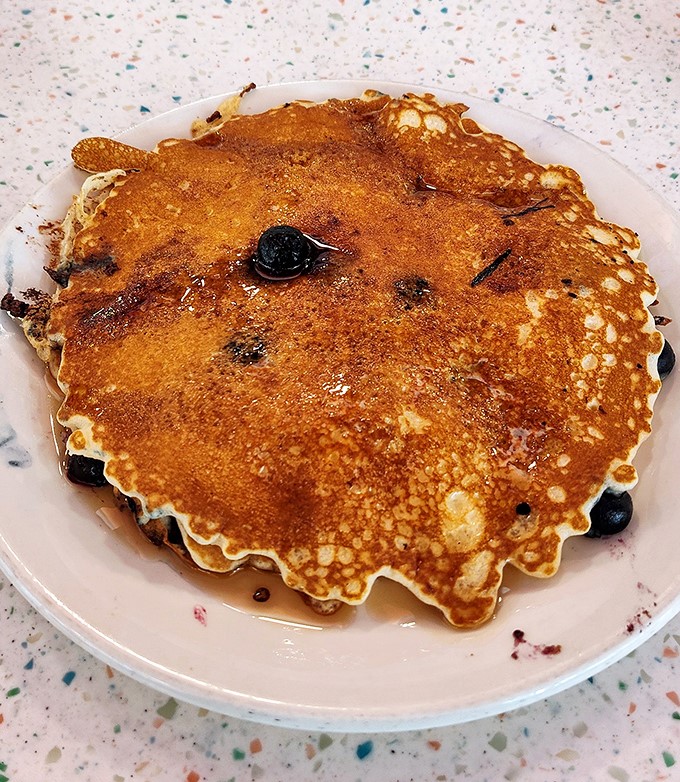 These blueberry pancakes don't just have berries&mdash;they've formed a delicious alliance. That golden-brown surface is the stuff of breakfast dreams.