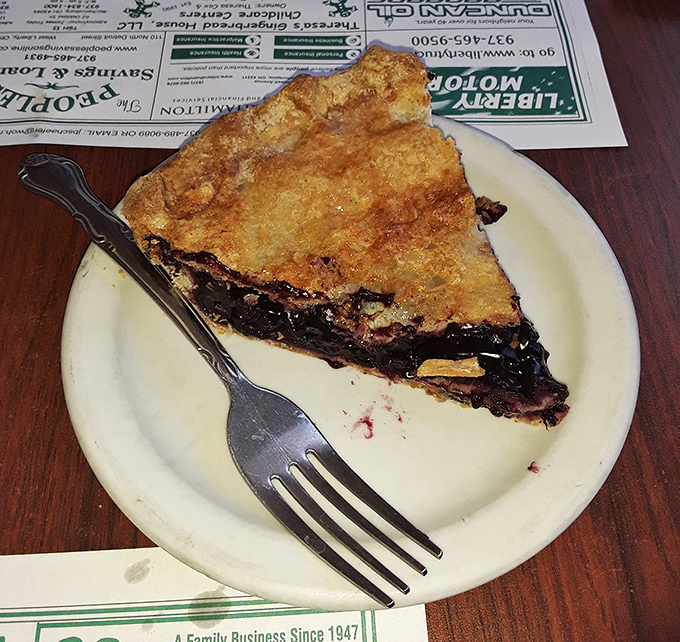 This isn't just blueberry pie&mdash;it's summer captured in a perfect golden crust. The fork marks tell you someone couldn't even wait for a photo.