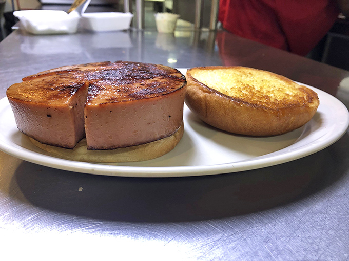 The bologna sandwich &ndash; childhood nostalgia upgraded with thick-cut meat that's been kissed by the grill until the edges curl in delight.