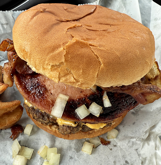 The bacon cheeseburger &ndash; where crispy meets juicy in a harmony so perfect it should have its own musical.