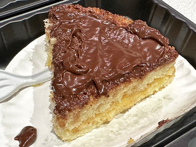 Boston cream pie that would make your grandmother proud. Two layers of golden cake embracing custard with a chocolate blanket on top.