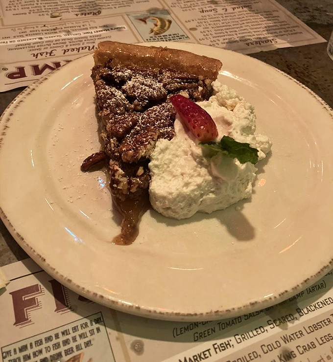 Bourbon pecan pie that strikes the perfect balance between decadence and comfort. The whipped cream is just showing off at this point.