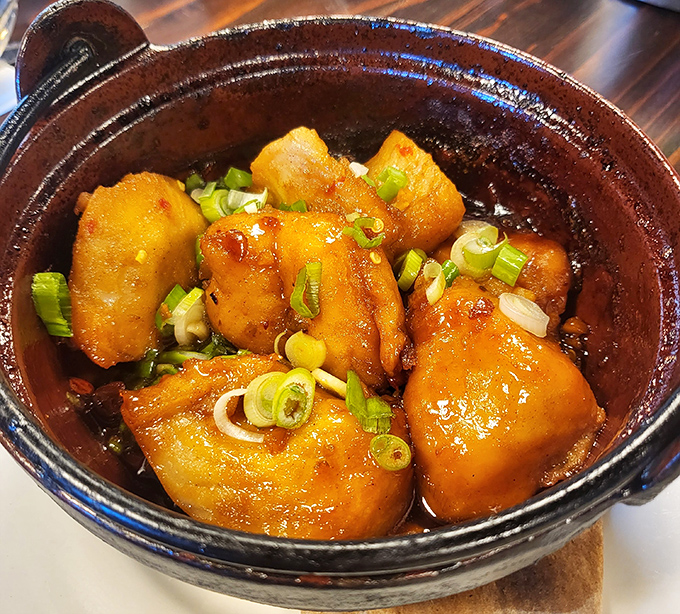 This clay pot of caramelized catfish is the comfort food you never knew you needed. The tender fish absorbs the sweet-savory sauce like a flavor sponge.