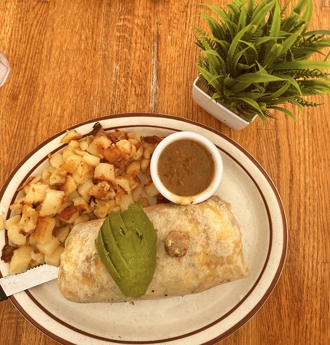 Breakfast burritos should always look this good &ndash; avocado peeking out like it's playing hide-and-seek with the perfectly crisped potatoes.