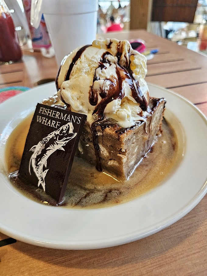 Decadent bread pudding crowned with ice cream, because sometimes you need dessert that matches the main course's ambition.