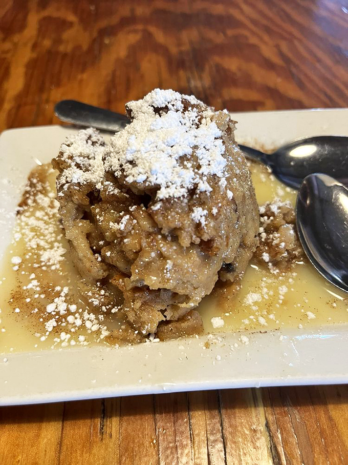 Bread pudding that would make your grandmother both jealous and proud, bathed in a sauce worth drinking straight.