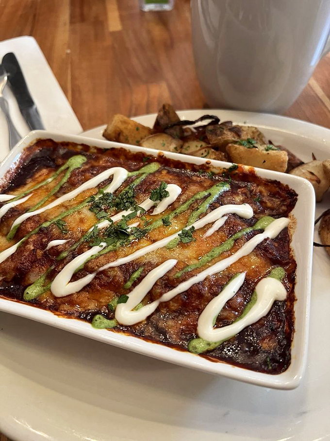 This breakfast burrito situation is serious business, drizzled with sauces and stuffed with enough deliciousness to fuel your entire morning.