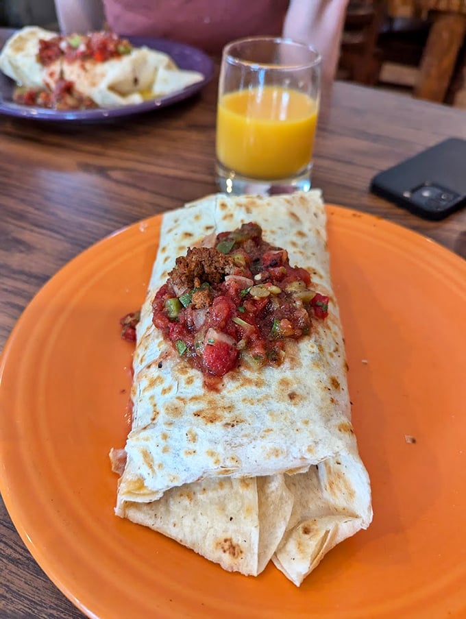 This breakfast burrito isn't just filled&mdash;it's packed with purpose. The salsa on top isn't garnish; it's the exclamation point on a morning statement.