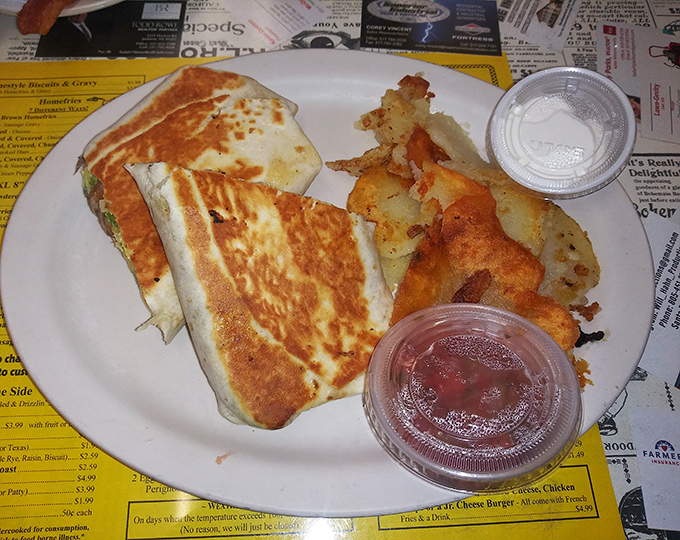 Golden breakfast burrito stuffed with crispy potatoes, proving good things come in grilled packages. 