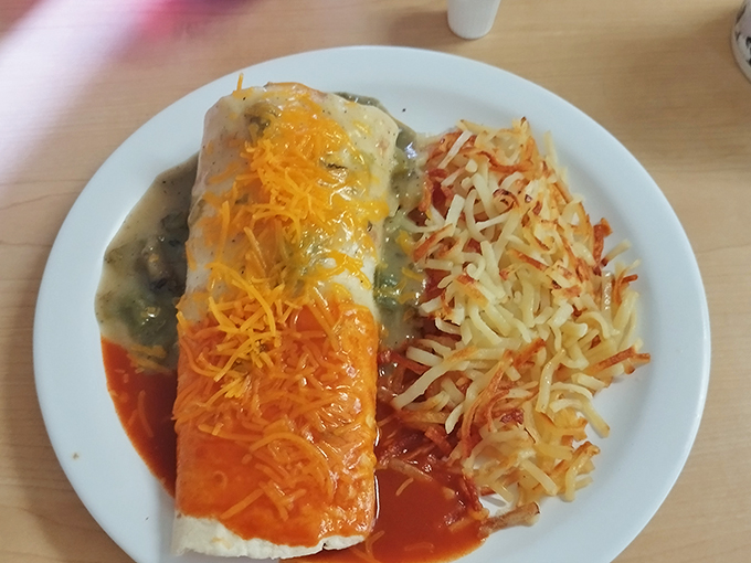 Christmas-style burrito perfection. Half red, half green chile – because in New Mexico, why choose when you can have both?