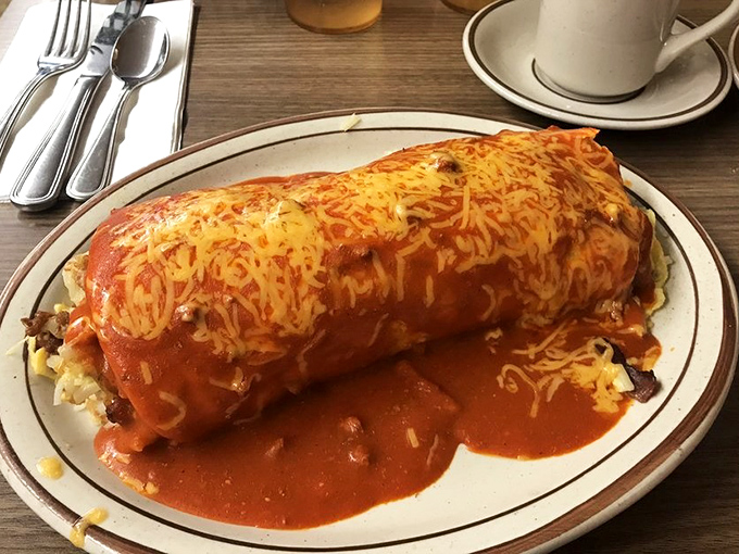 This breakfast burrito smothered in red chile and melted cheese is what legends are made of, folks, plain and simple.