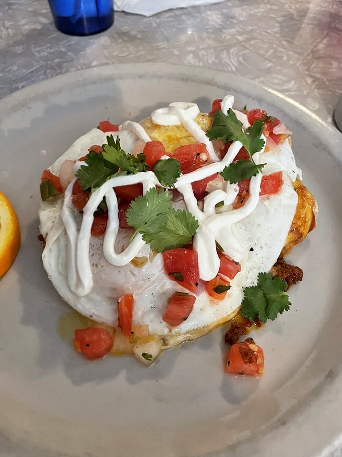 These breakfast enchiladas topped with fresh pico and cream are the reason Atlantans set their alarms early.