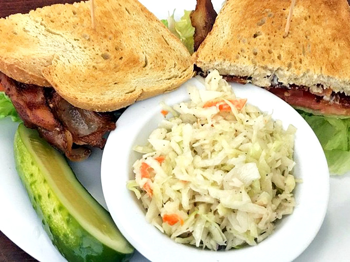 The classic BLT with coleslaw&mdash;proof that sometimes the simplest pleasures are the most profound. That pickle isn't just garnish; it's punctuation.
