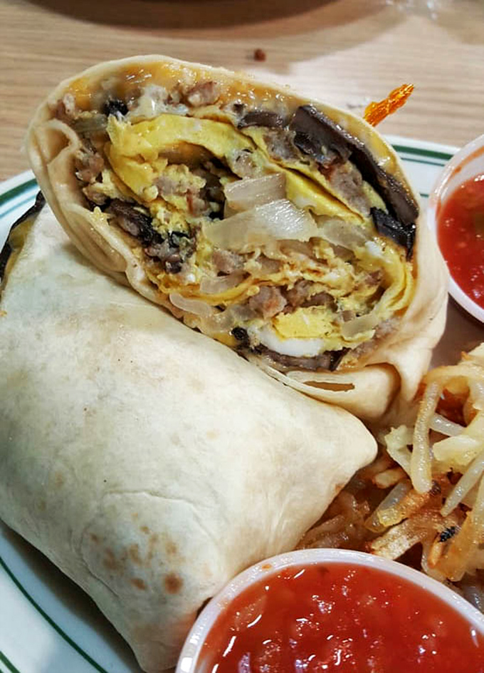 That breakfast burrito comes stuffed with eggs, meat, and cheese, wrapped tight like a delicious gift you give yourself.