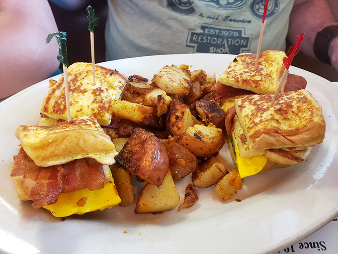The breakfast sandwich &ndash; architecture you can eat! Toasted bread, melty cheese, and those home fries that could make a potato farmer weep with pride.