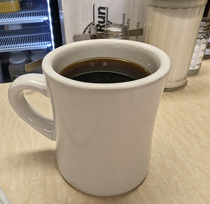 The humble diner mug&mdash;civilization's most perfect coffee delivery system. No fancy latte art needed when the brew speaks this eloquently. 