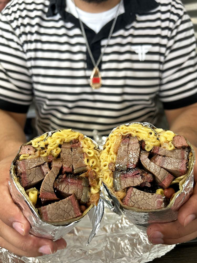Whoever first decided to wrap brisket and mac and cheese in a burrito deserves a Nobel Prize in Culinary Innovation.