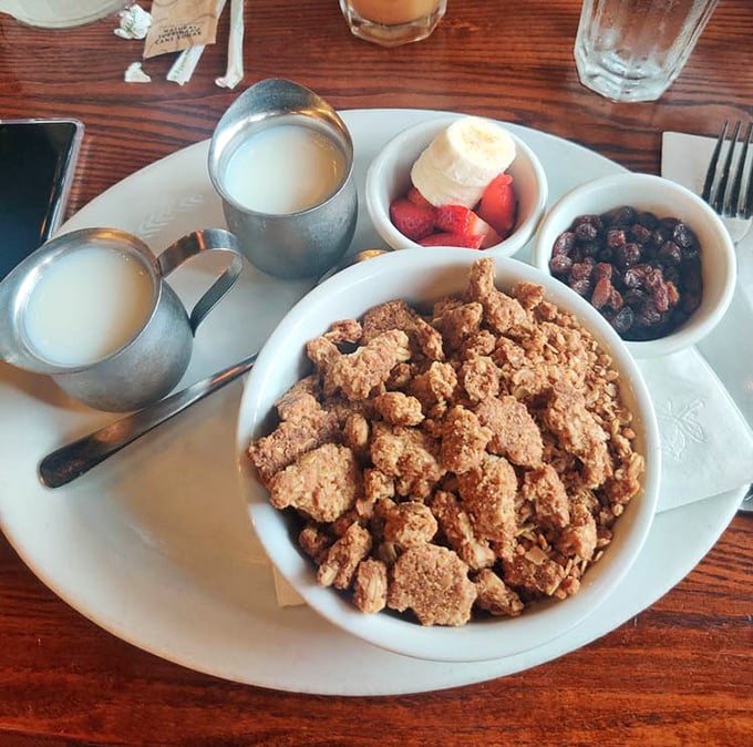 Cereal at home? Never again after experiencing this granola paradise with fresh fruit and creamy milk &ndash; simple perfection on a plate.