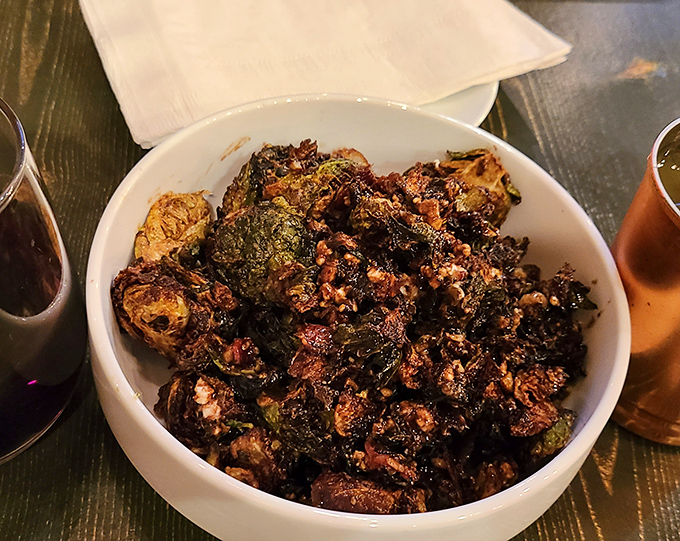 Brussels sprouts get the respect they deserve here, caramelized and seasoned until even skeptics become believers overnight.
