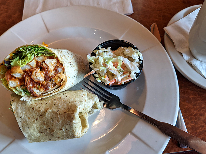 A wrap that solves the eternal buffalo wing dilemma: how to enjoy that tangy, spicy goodness without wearing half of it home.