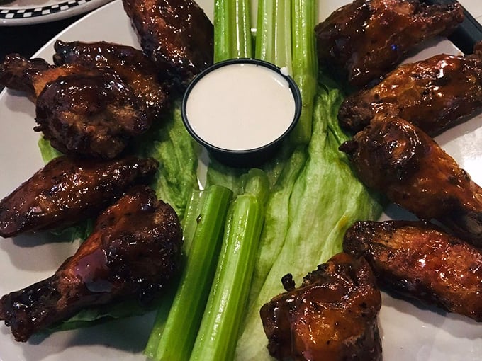 These buffalo wings aren't just glazed&mdash;they're dressed for success. Crispy, saucy, and arranged like they're posing for their album cover.