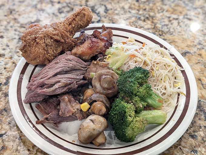 The "I'm an adult and no one can stop me" plate. Fried chicken, mushrooms, broccoli, and noodles coexisting in beautiful harmony.
