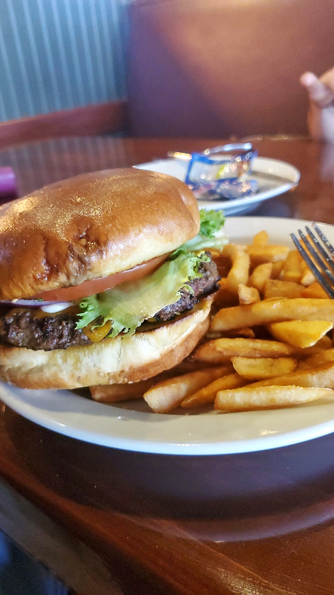 The Mountain Burger lives up to its name&mdash;a towering achievement of beef, cheese, and fresh toppings that requires a strategic approach to eating.