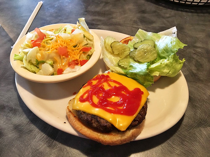 Sometimes happiness is as simple as a perfectly melted cheese burger, a side salad for your conscience, and knowing nobody's rushing you to leave.