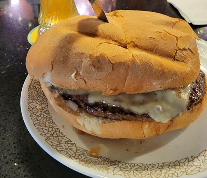 This burger isn't trying to impress Instagram – it's too busy focusing on the important business of being absolutely delicious.