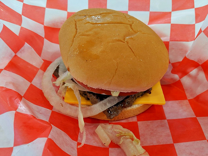 A cheeseburger that doesn't need Instagram filters &ndash; just your undivided attention and an empty stomach. American poetry on a bun.
