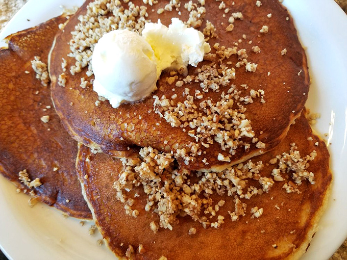 These butter pecan pancakes aren't just breakfast, they're an event. The crumbled nuts add texture that makes every bite a tiny celebration.