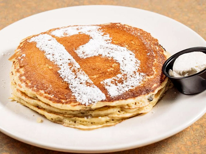These pancakes with their dusting of powdered sugar aren't just breakfast &ndash; they're edible pillows of joy that make waking up worthwhile.
