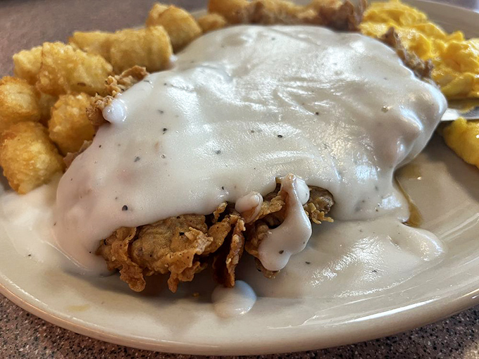 When gravy cascades over chicken fried steak like this, you know you're in good hands. Comfort food elevated to an art form.