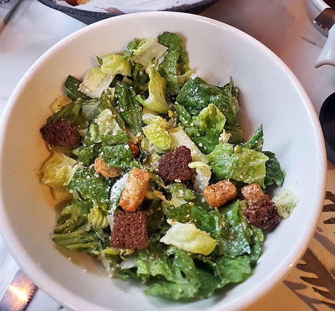 A Caesar salad that Julius himself would approve&mdash;crisp romaine, proper dressing with anchovy backbone, and croutons that crunch like autumn leaves.