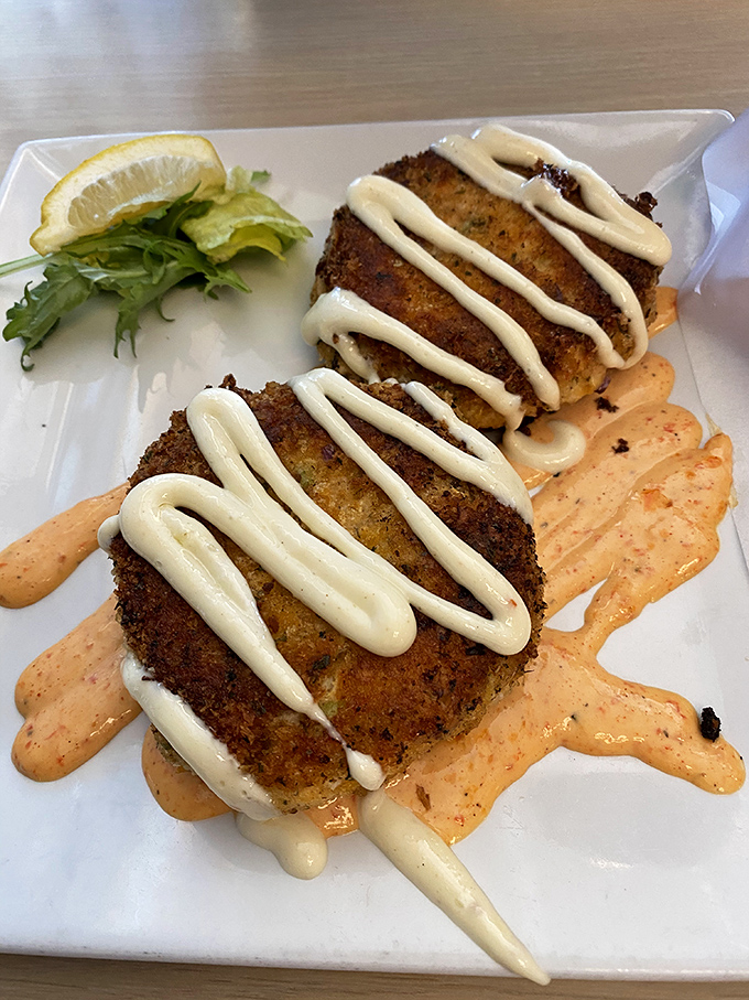 Crusted, sauced, and artfully plated &ndash; these seafood cakes are fancy enough for dates, delicious enough for seconds.