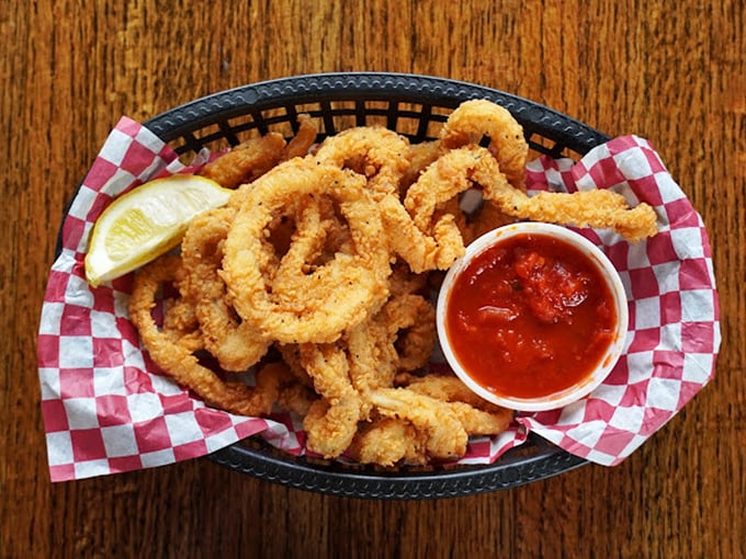 These calamari rings aren't playing hard to get&mdash;tender, crispy, and ready for a dip in that vibrant marinara. Ocean-to-table perfection.