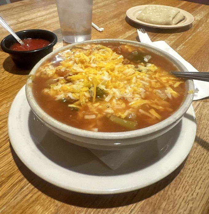 This caldo de queso isn't just soup&mdash;it's a warm hug in a bowl, topped with melted cheese that stretches with each spoonful.