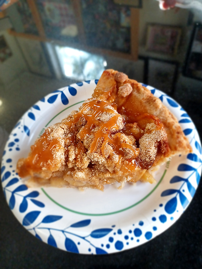 Caramel drizzled apple pie that doesn't just whisper "autumn"&mdash;it wraps you in a flannel blanket of cinnamon-spiced comfort. 