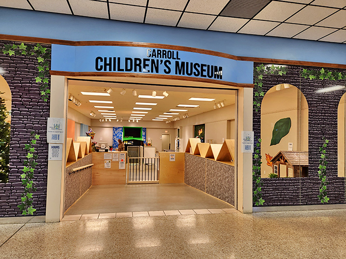 The Carroll Children's Museum entrance beckons with colorful promise. Grandparents, prepare your knees for bending and your vocabulary for explaining rotary phones to bewildered youngsters.