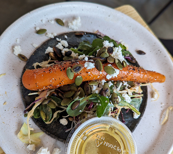 Who knew a carrot could make you forget about meat? This taco transforms the humble root vegetable into the main character it always dreamed of being.