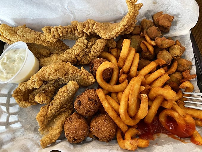 Golden-fried catfish, hush puppies, and curly fries&mdash;a Louisiana trifecta that proves sometimes the best things in life come from a deep fryer. 