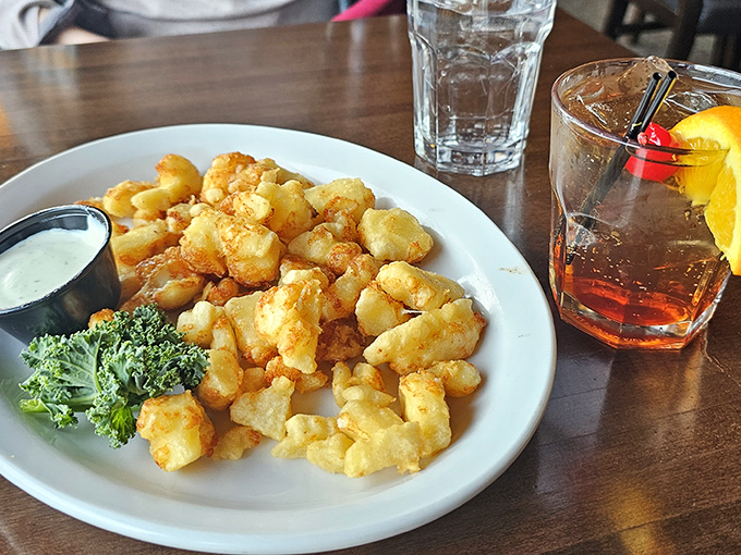 Golden cheese curds that crunch like tiny flavor fireworks celebrating in your mouth.