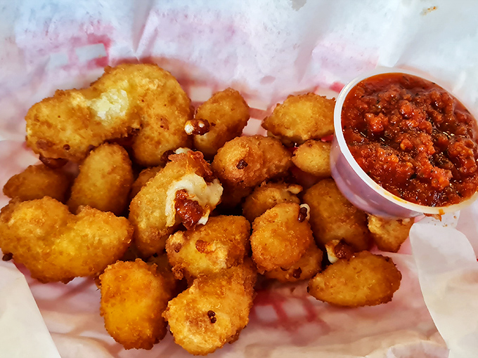 Cheese curds that squeak with Wisconsin pride but found their second home in Pennsylvania, paired with marinara that means business.