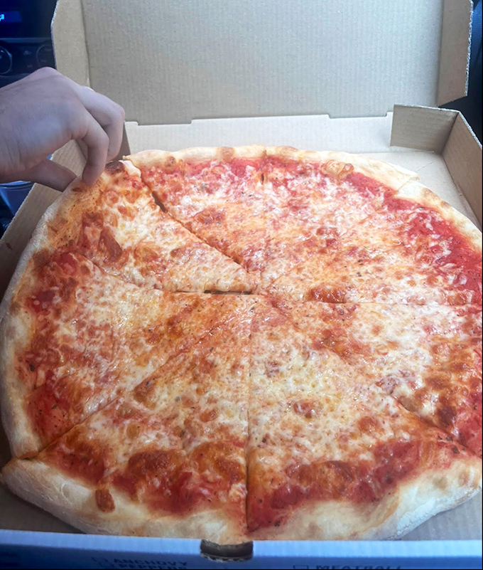 The perfect cheese pizza &ndash; where simplicity becomes art and every slice disappears faster than you planned.