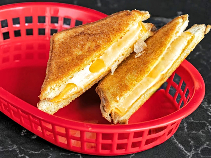 The humble grilled cheese&mdash;elevated to art form. When cheese pulls like this, it's not just lunch; it's performance art on a plate.